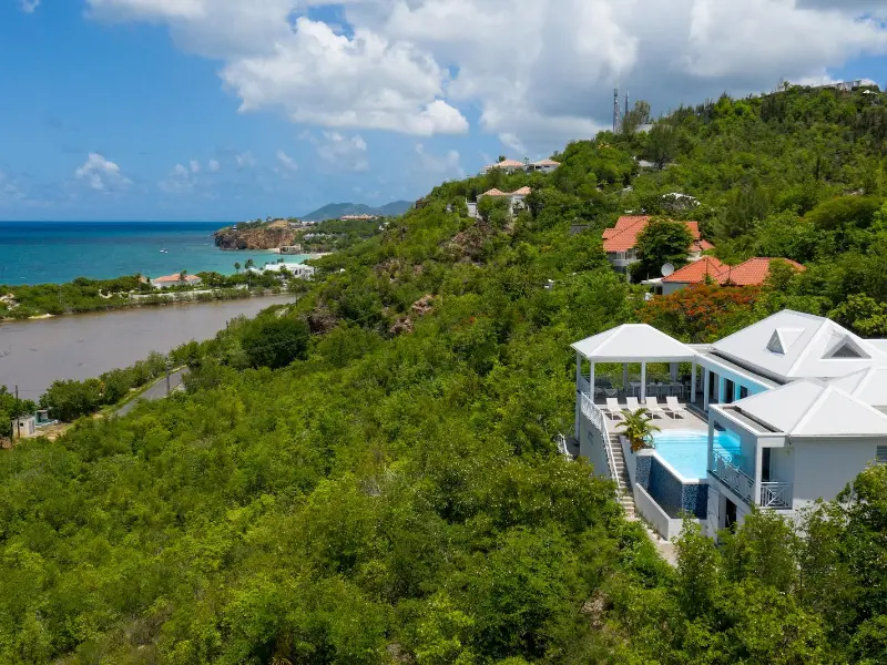 Contemporary Luxe Villa with Infinity Pool and Red Bay Beach Views from ...